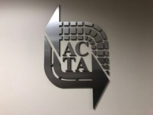 ATCA Uses Brushed Metal Wall Logo to Brand Entryway in Long Beach CA